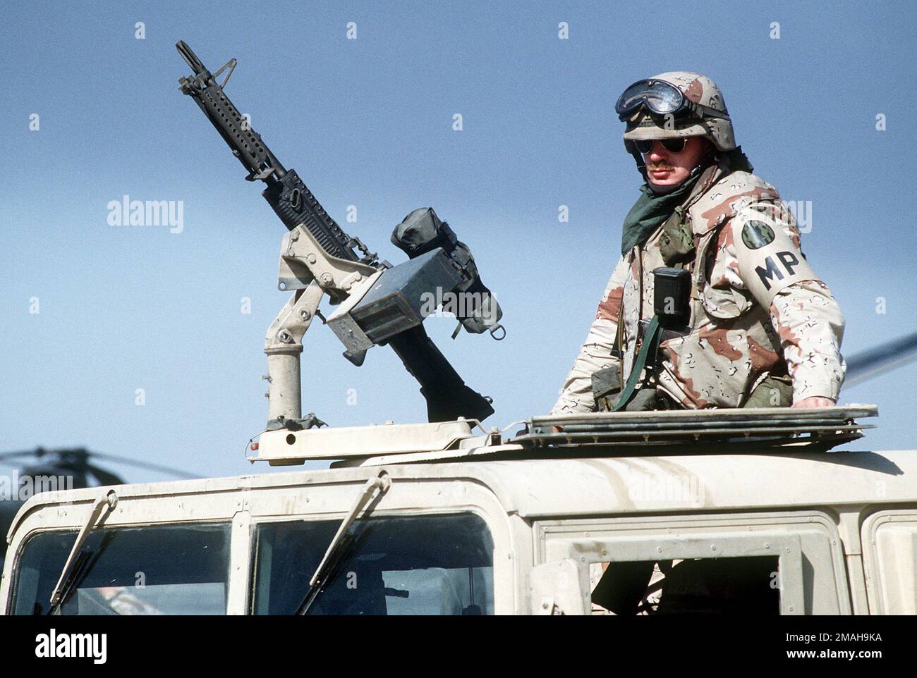 Marine Lance CPL. Patrick Ericson mans an M-60 general-purpose machine ...