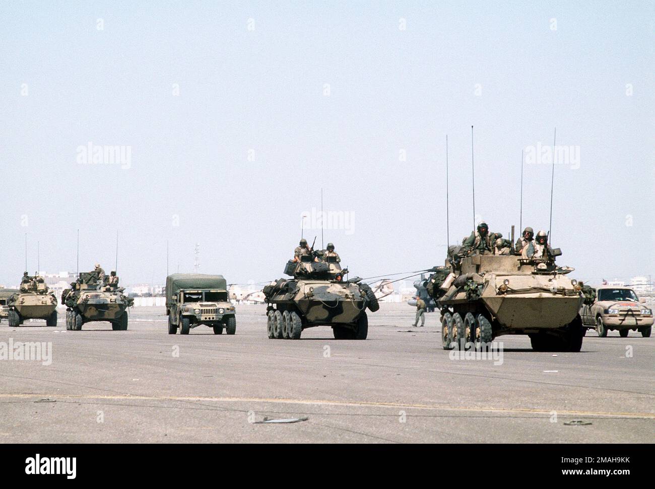 U.S. Marines roll into Kuwait International Airport in light armored ...