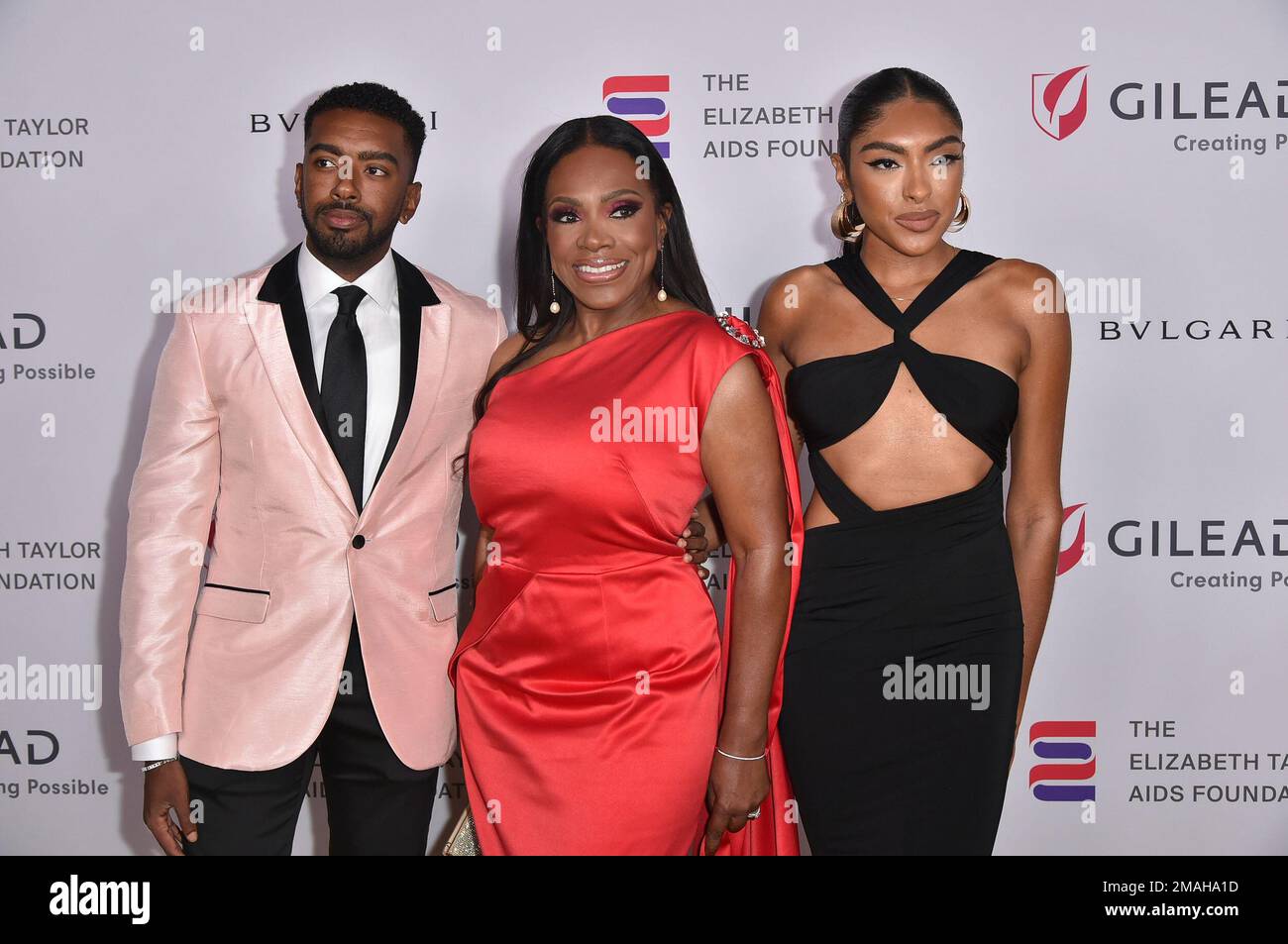 Etienne Maurice, from left, Sheryl Lee Ralph and Ivy Coco Maurice arrive at The Elizabeth Taylor ...