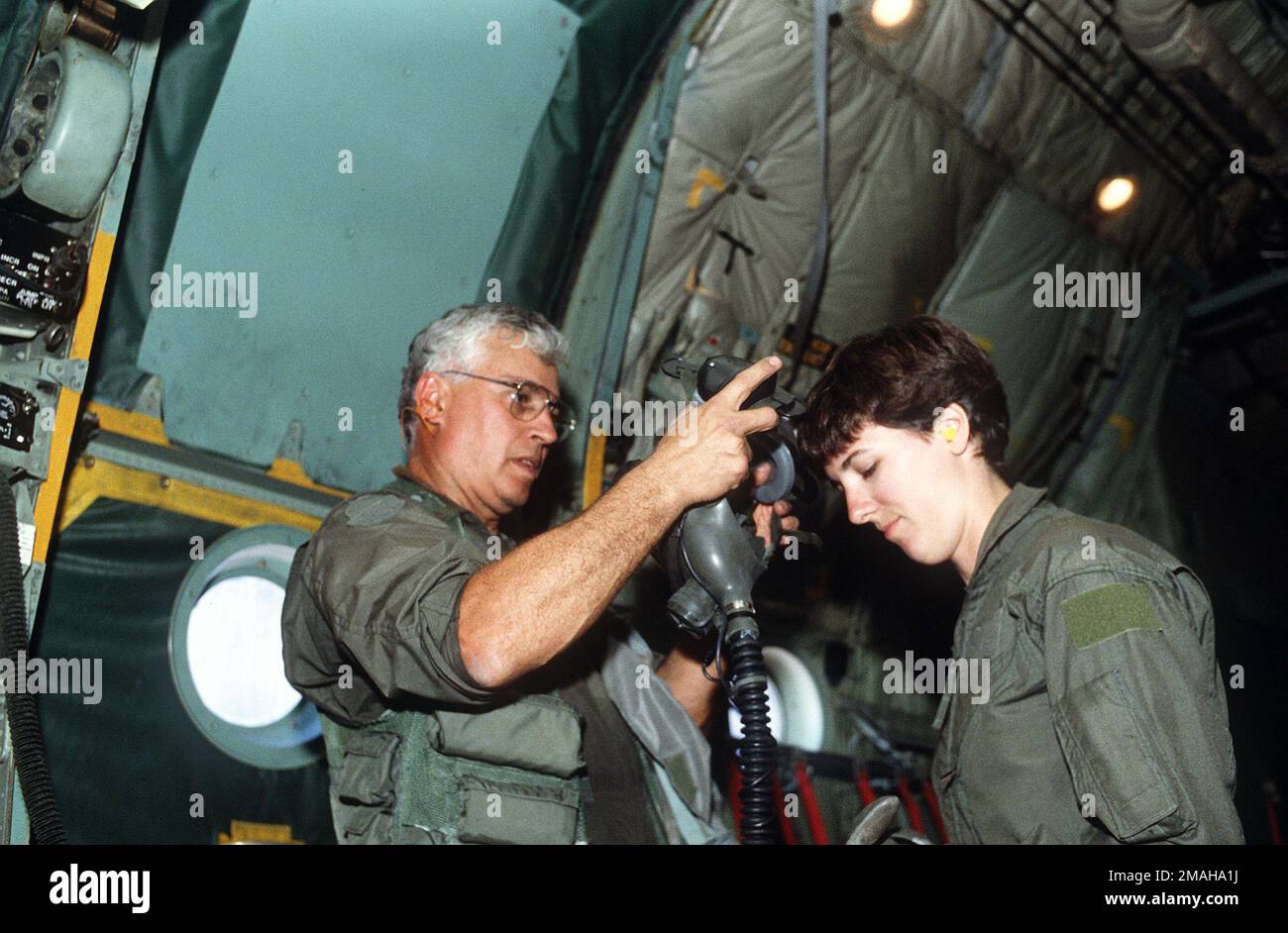 SENIOR MASTER SGT. James Cundall, left, a medical technician from the ...