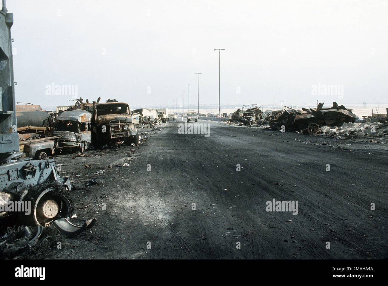 A high-mobility, multipurpose, wheeled vehicle travels along the Basra ...