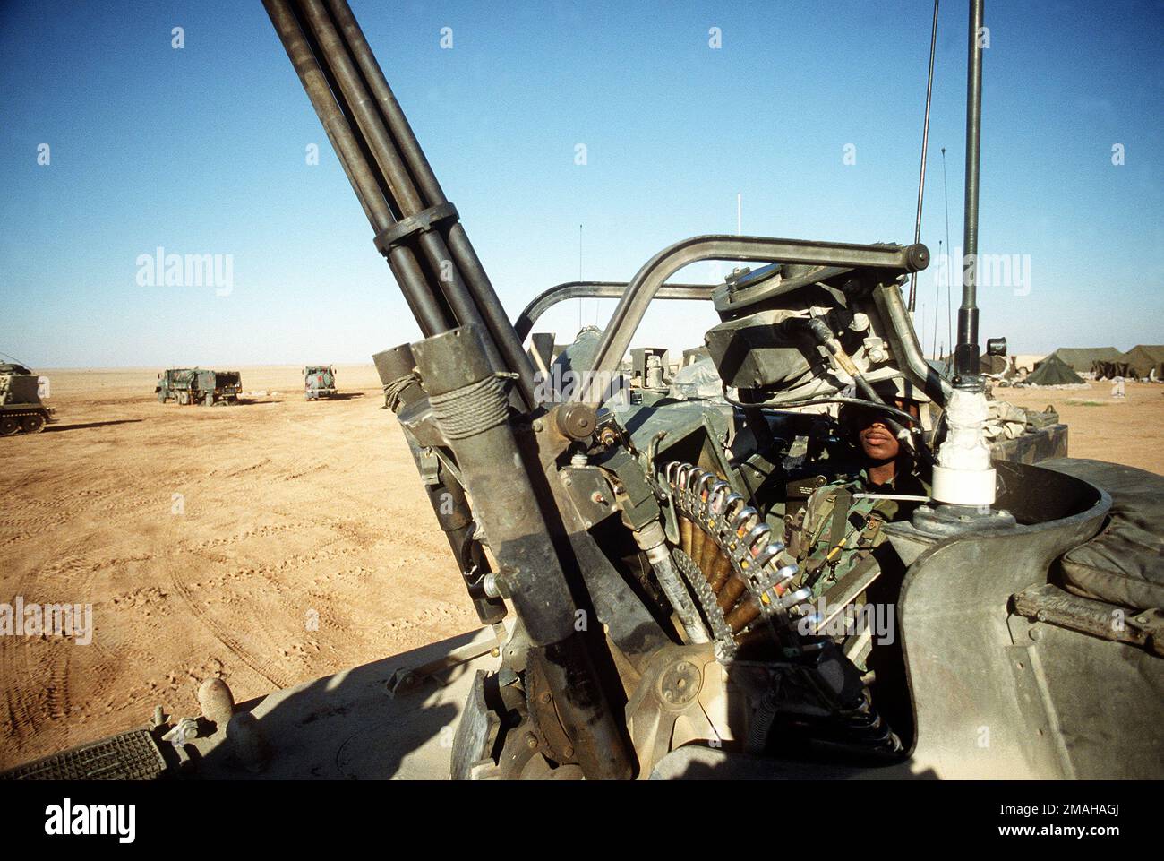 A gunner mans the 20mm M-168 Vulcan gun on an M-163A1 self-propelled ...