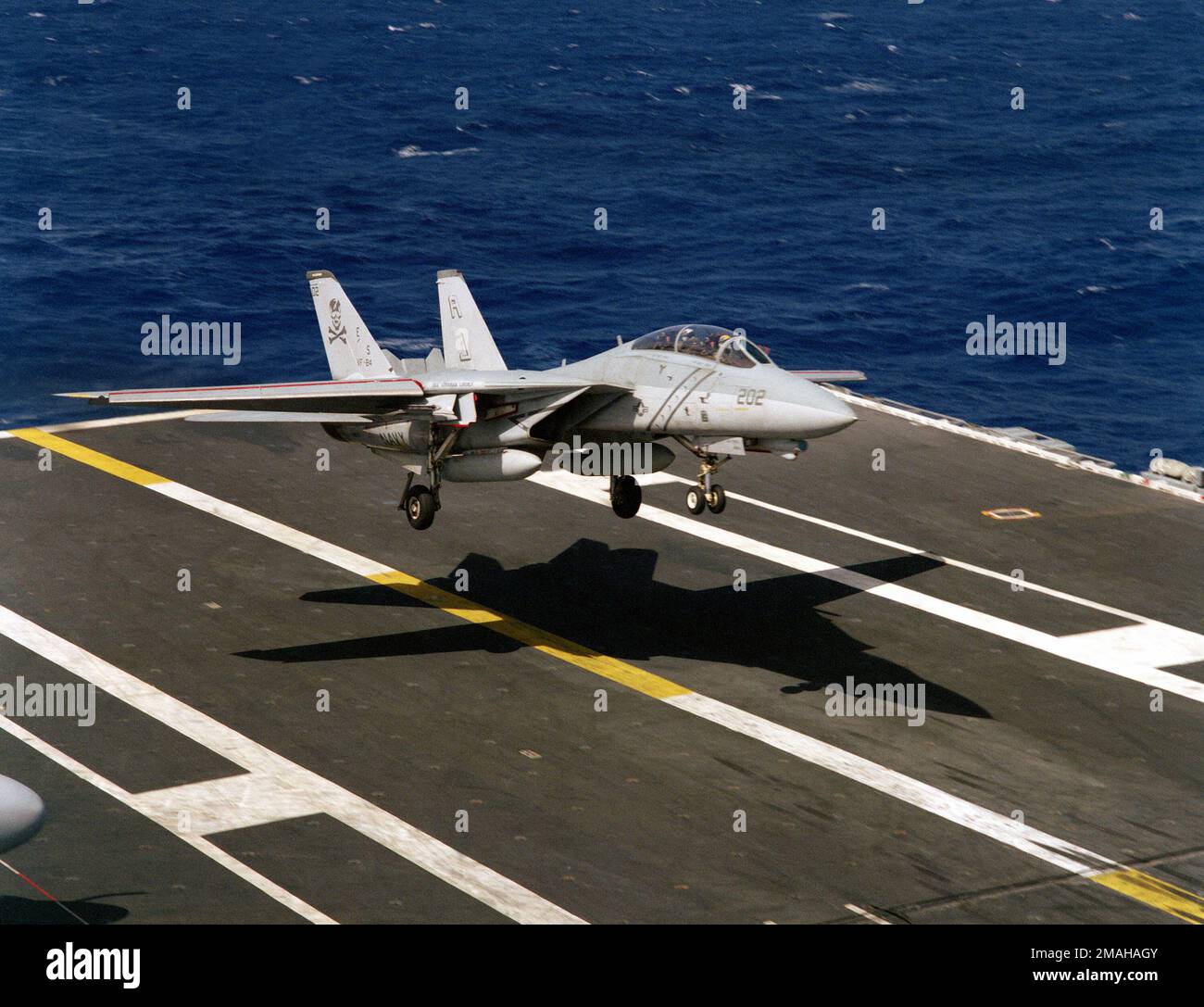 A Fighter Squadron 84 (VF-84) F-14A Tomcat aircraft comes in for an ...