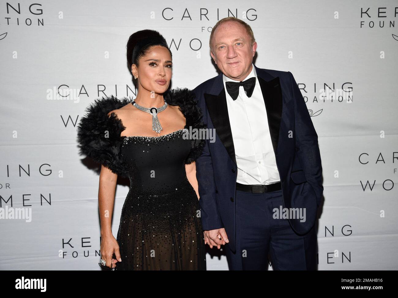 Salma Hayek Pinault, left, and husband Francois-Henri Pinault attend ...