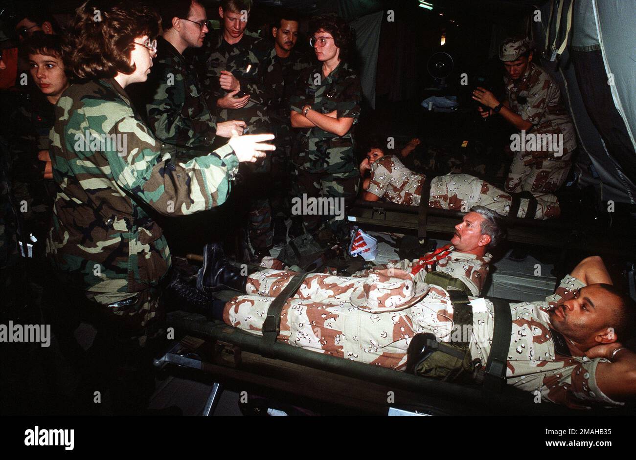 Medical personnel take part in a mass casualty exercise during ...