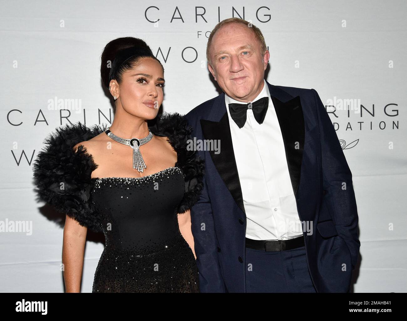 Salma Hayek Pinault, left, and husband Francois-Henri Pinault attend ...