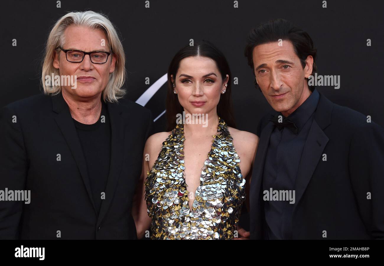 Andrew Dominik, Ana de Armas and Adrien Brody arrive at the premiere of ...
