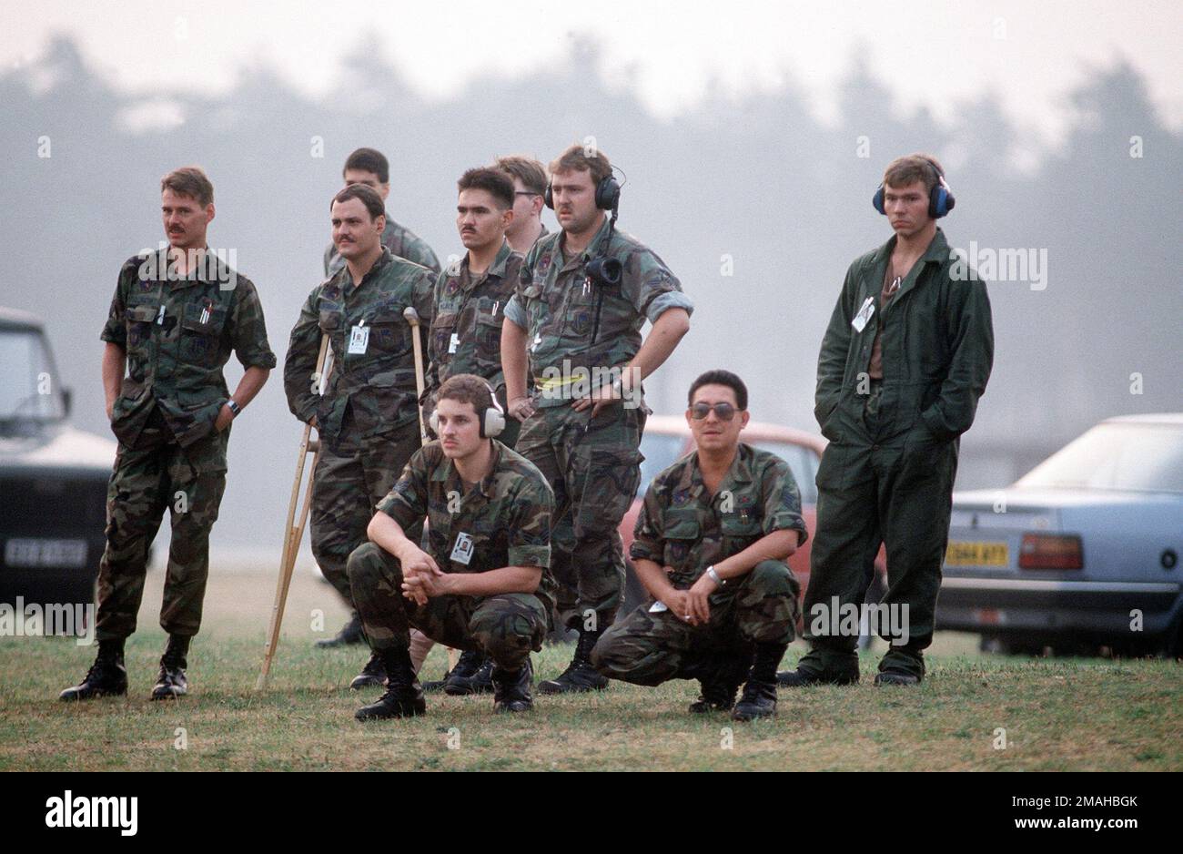 AIRMAN watch as 48th Tactical Fighter Wing F-111F aircraft prepare to ...