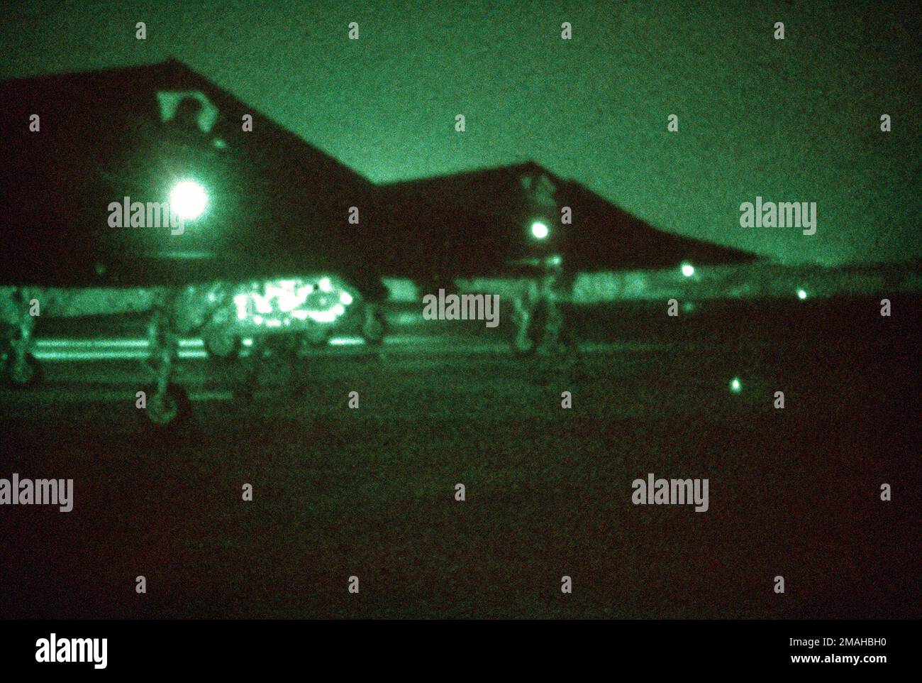 As seen through a night vision lens, two 37th Tactical Fighter Wing ...