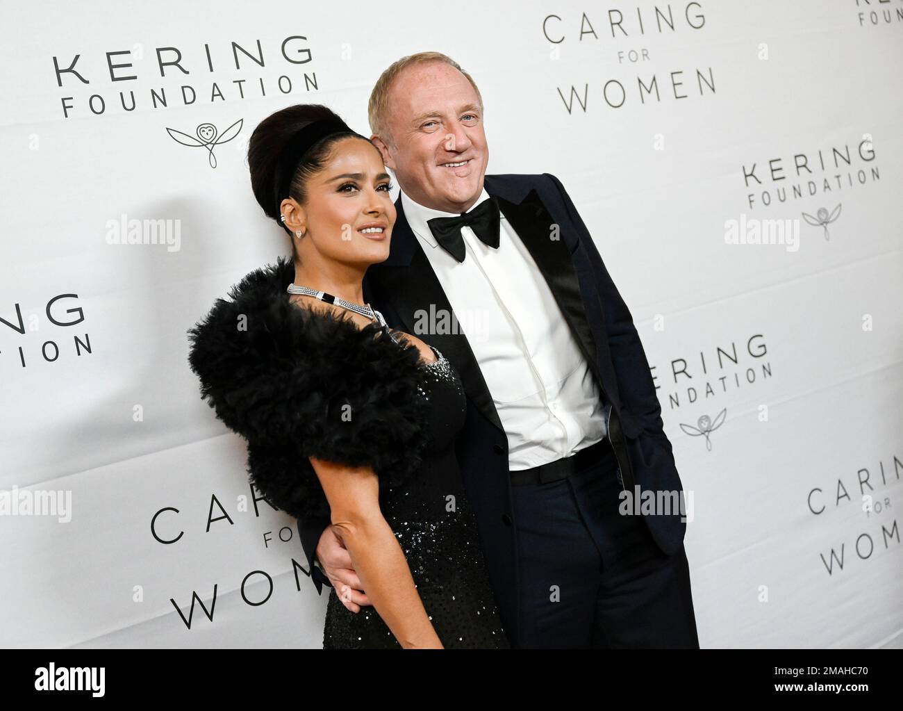 Salma Hayek Pinault, left, and husband Francois-Henri Pinault attend ...