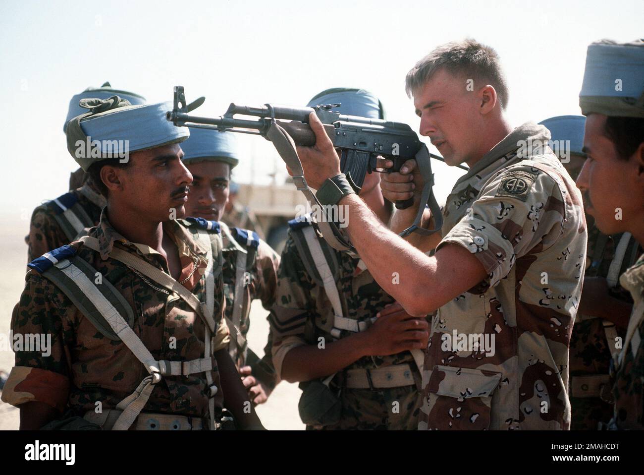 Egyptian soldiers instruct a member of the 82nd Airborne Division on ...