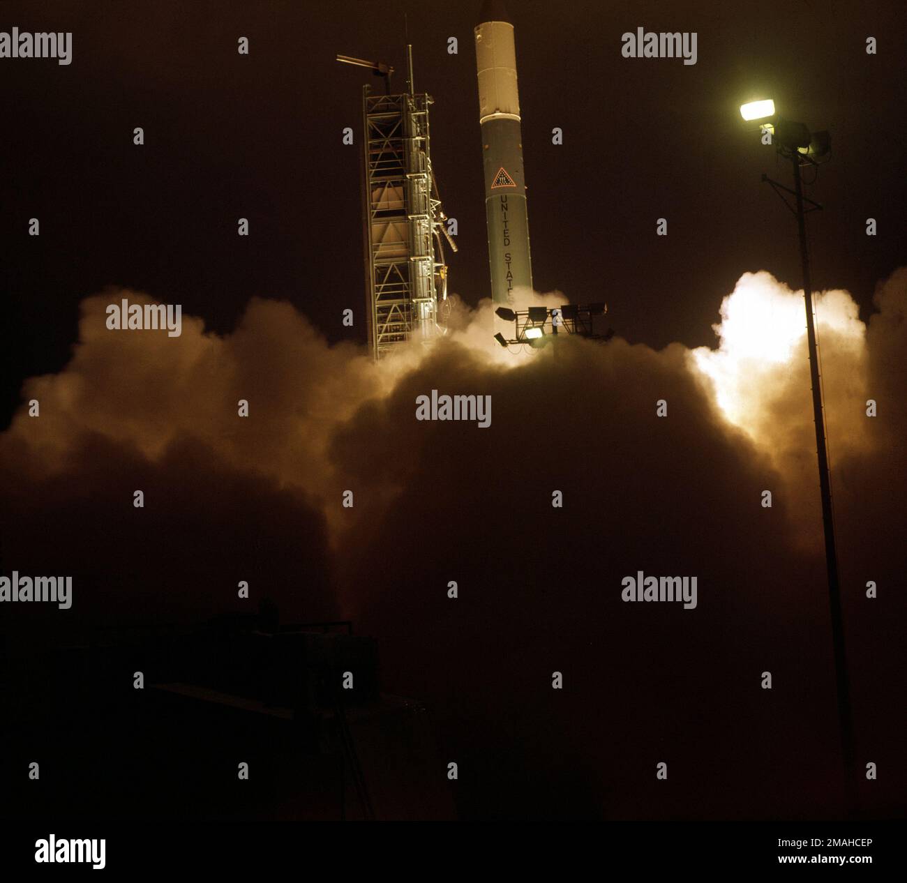 A Thor Delta missile is launched. Base: Vandenberg Air Force Base State ...