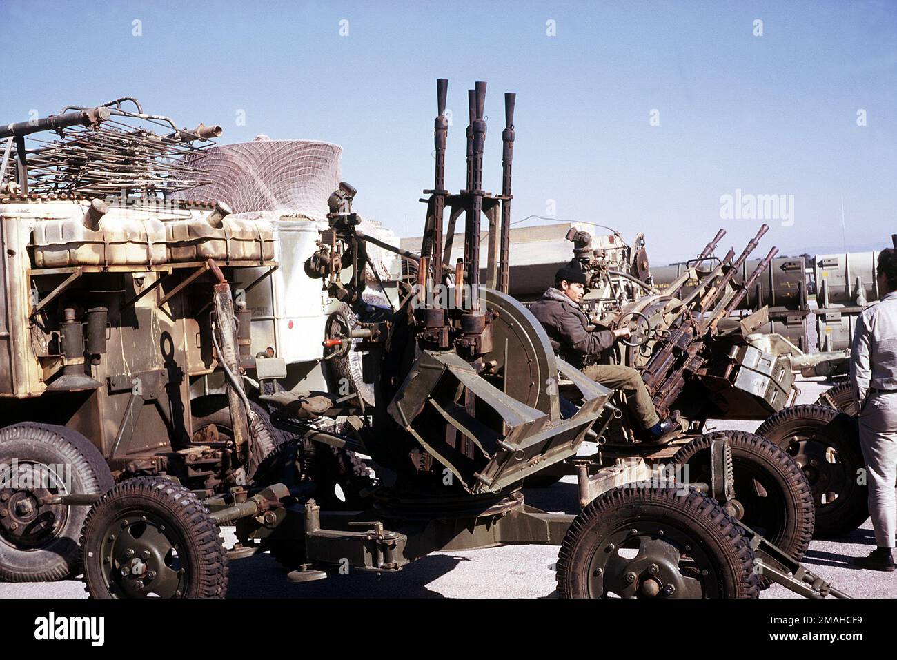 A Soviet-made ZPU-4 14.5mm anti-aircraft machine gun. A person is in ...