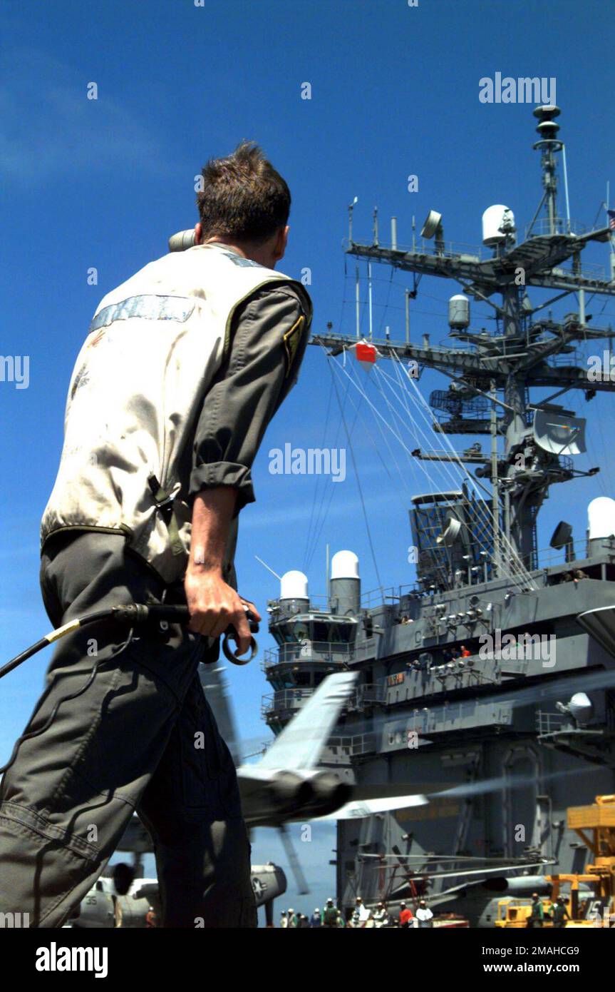 A Landing Signals Officer (LSO), aboard the USS CARL VINSON (CVN 70 ...