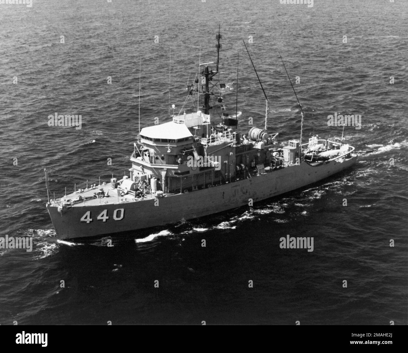 Port bow view of the ocean minesweeper USS EXPLOIT (MSO-440) underway ...