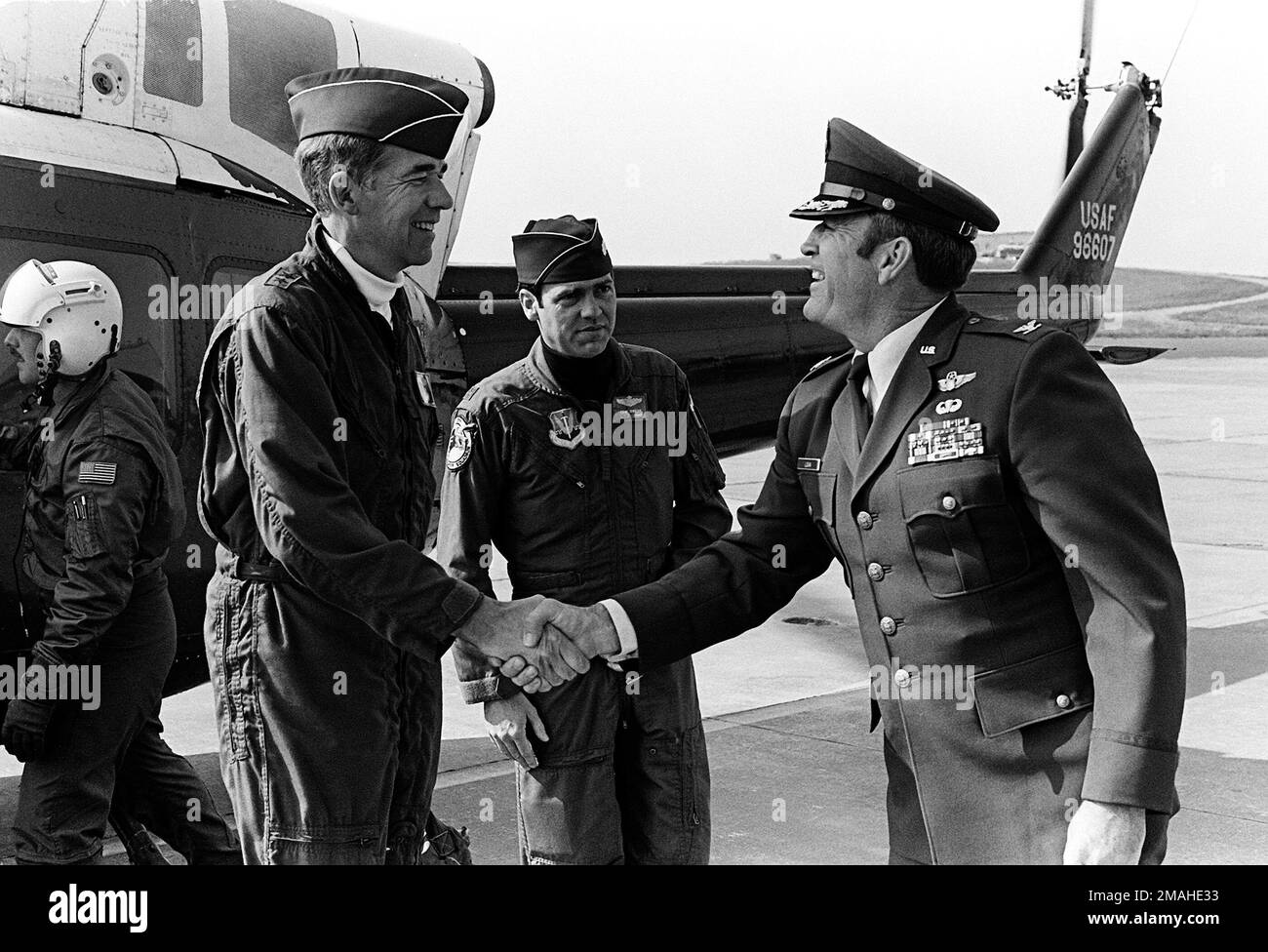 MGEN John T. Chain is greeted by COL Albert Logan before an F-15 Eagle ...