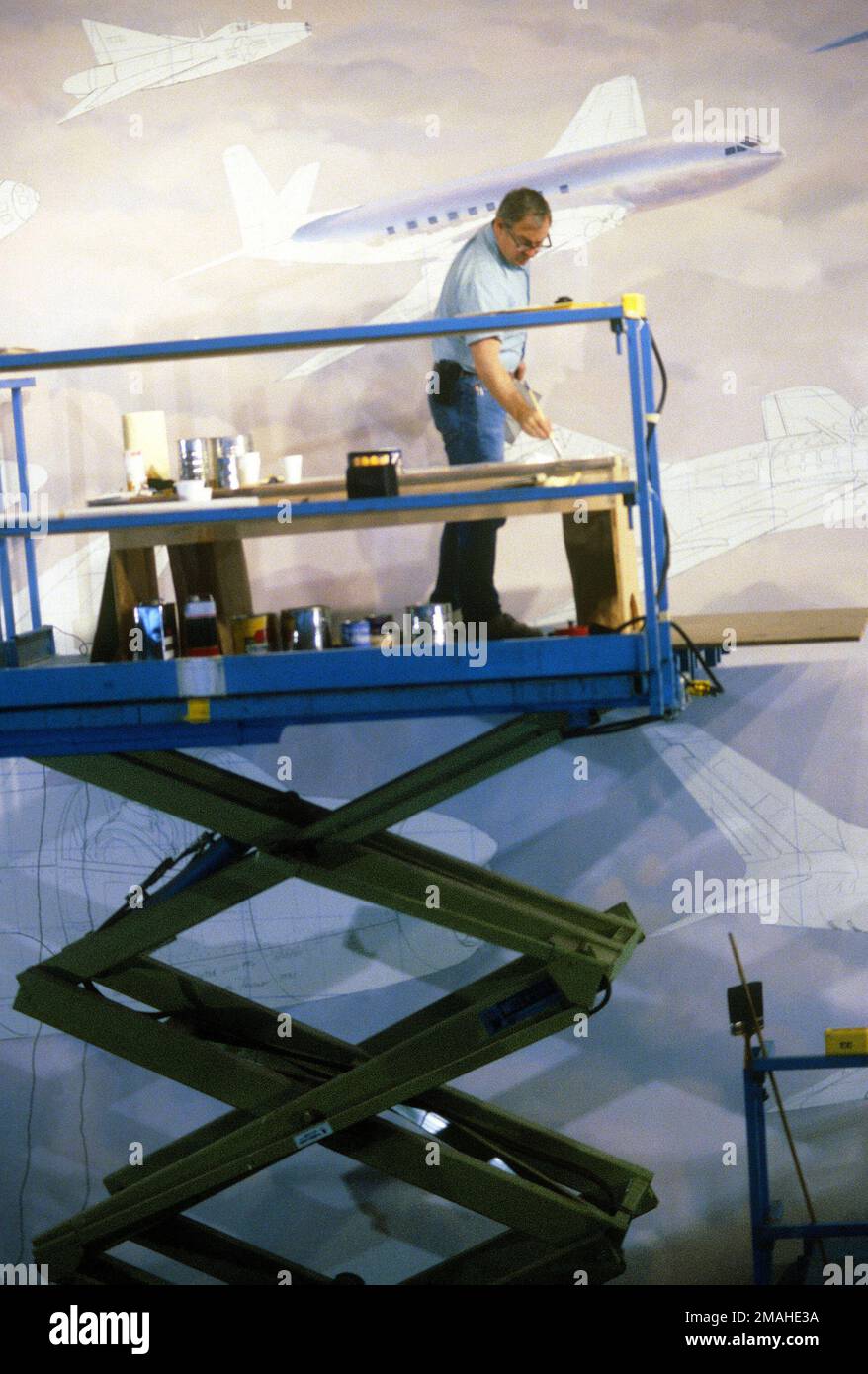 Keith Ferris, an aviation artist, paints a mural picture of aircraft ...