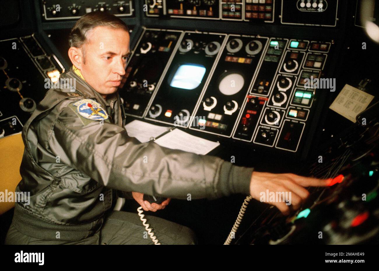 MAJ Stu Bischoff operates the control unit for the F-104G Starfighter ...