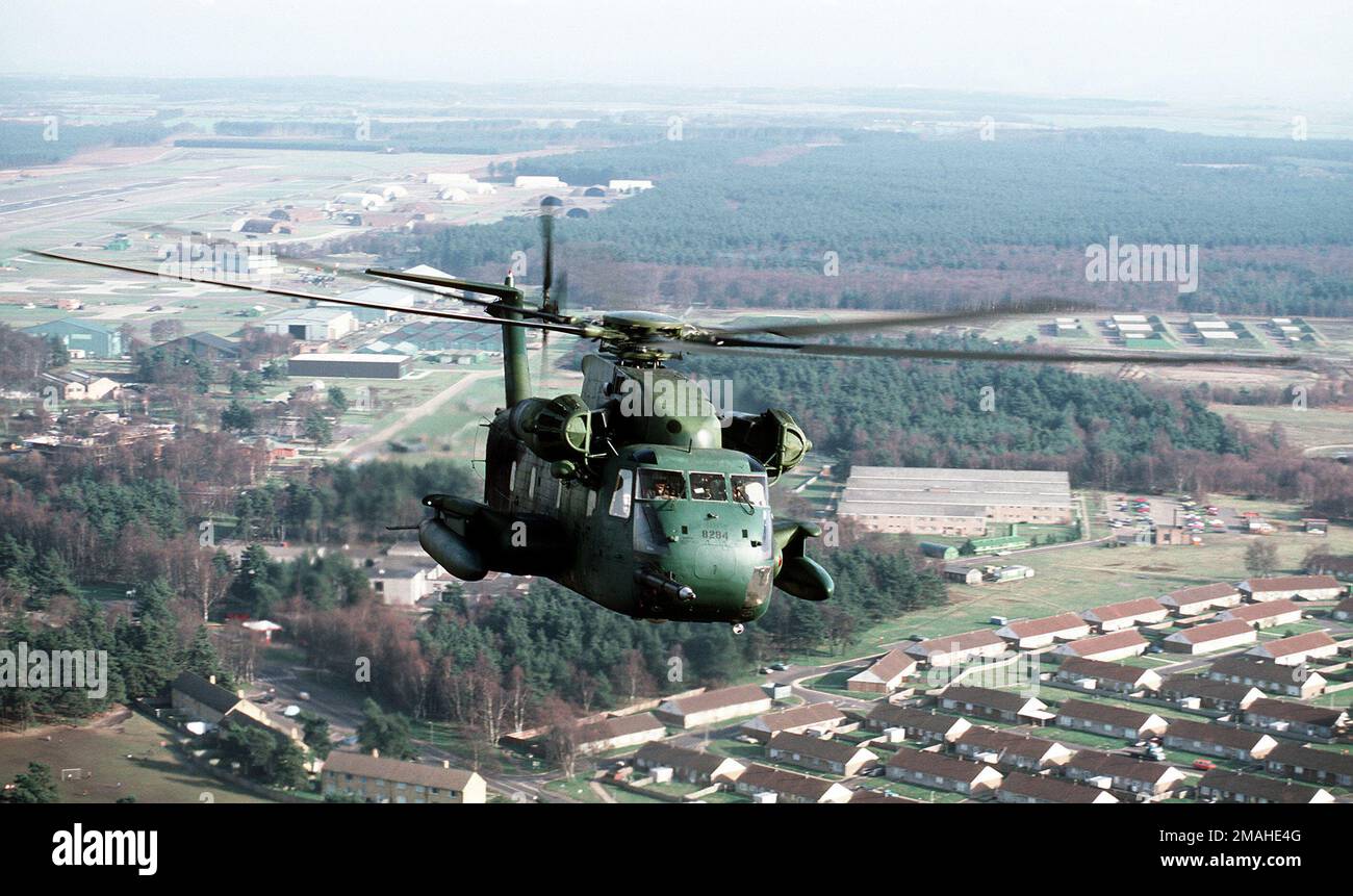 A right front air-to-air view of an HH-53 Super Jolly helicopter flown ...