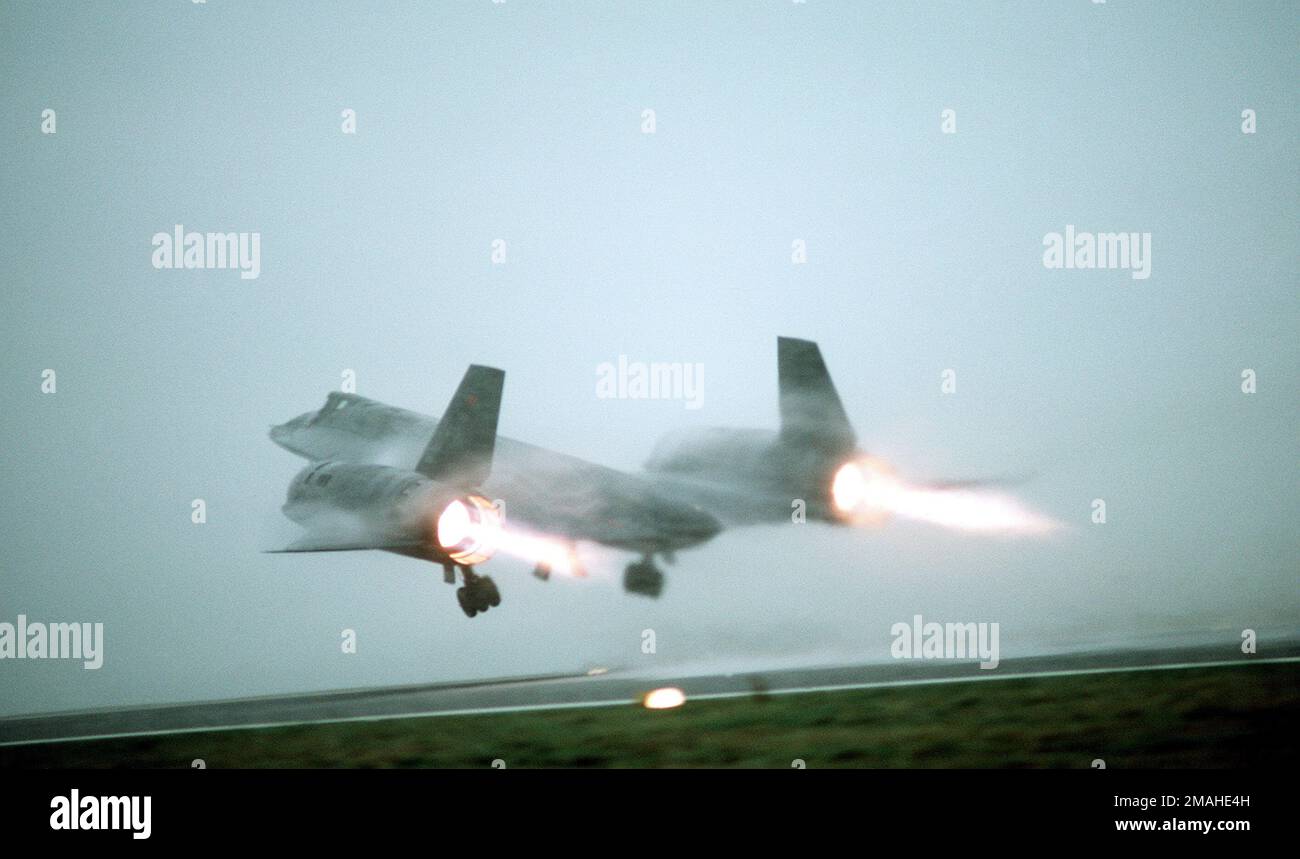 A ground-to-air left rear view of an SR-71 Blackbird aircraft taking ...