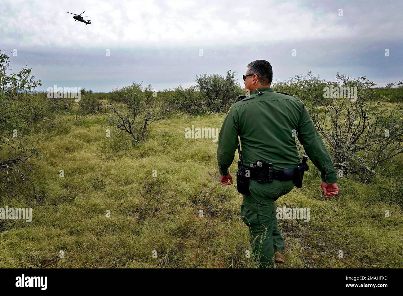 U.S. Border Patrol agent Jesus Vasavilbaso, aided by a Black Hawk ...