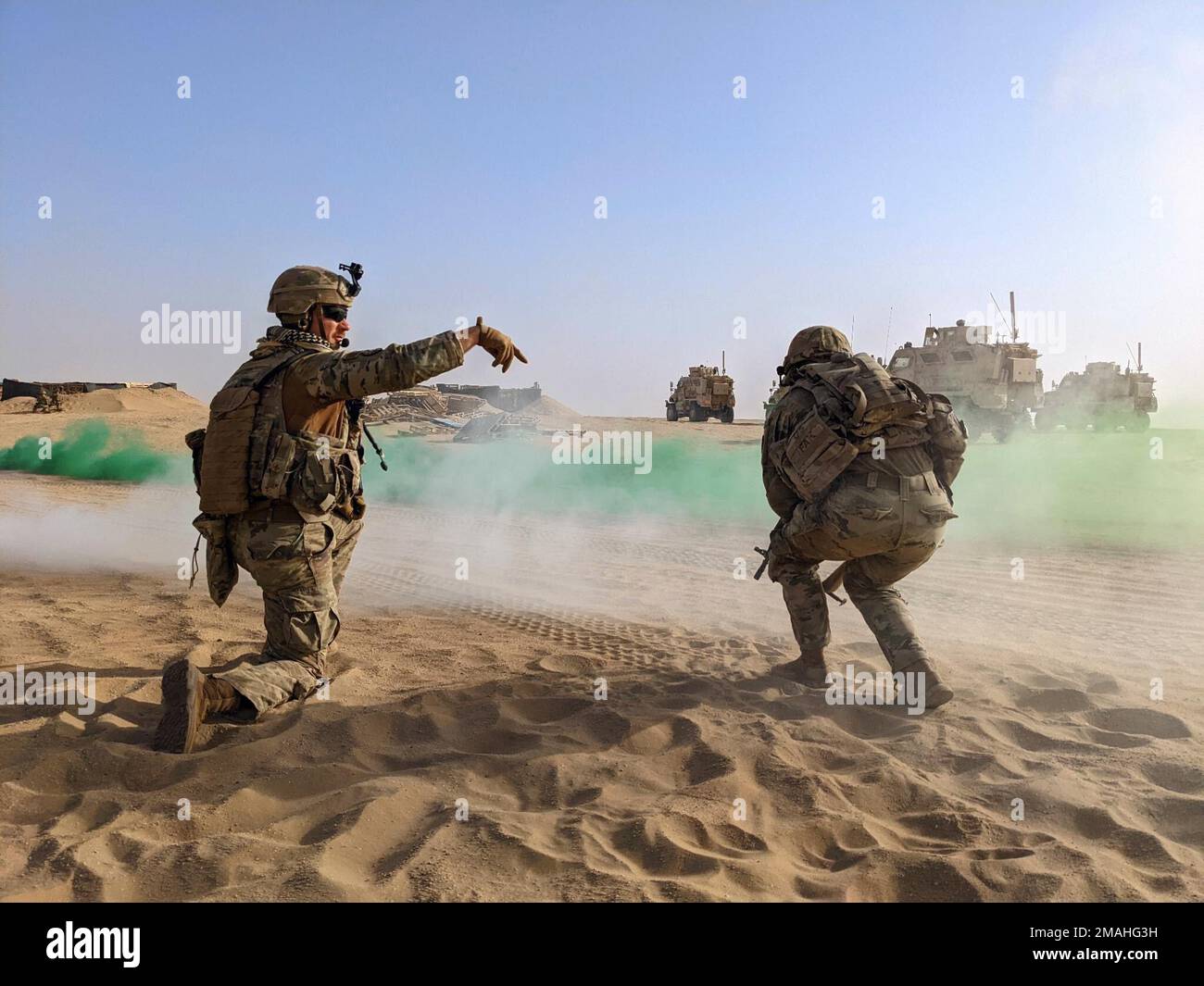 Two Soldiers from Task Force Griz of the 1st Combined Arms Battalion ...