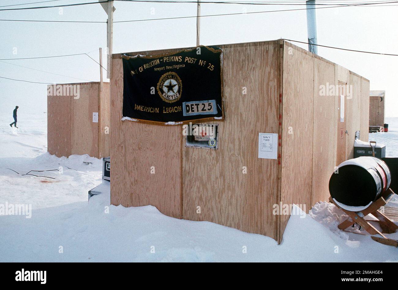 An American Legion banner hangs on the wall of a structure that is part ...