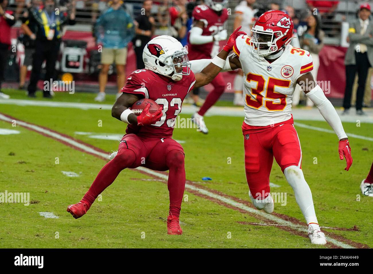 Arizona Cardinals receiver Greg Dortch (83) tries to run away from ...