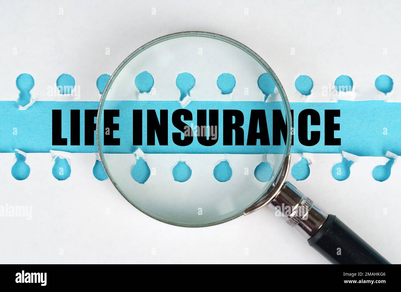 Between two sheets from a notebook on a blue stripe with the ...