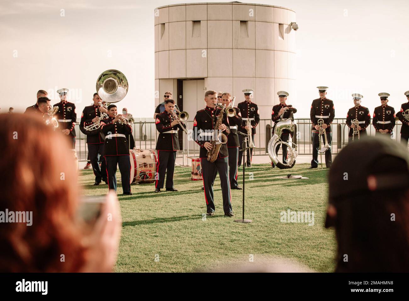 U.S. Marine Corps Cpl. Cameron Wanser, center, a saxophone instrumentalist assigned to the 1st ...