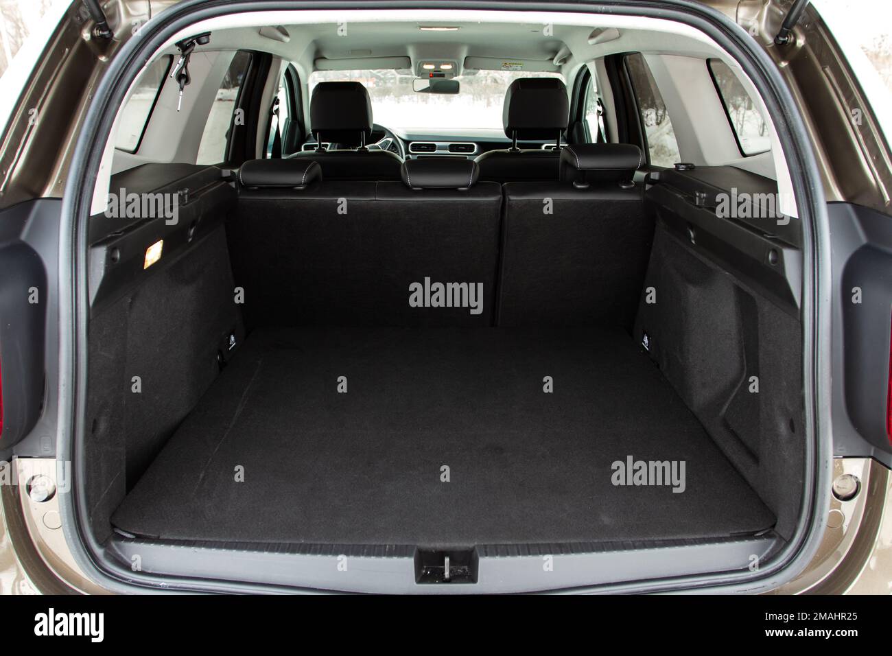 Huge, clean and empty car trunk in interior of compact suv. Rear view ...