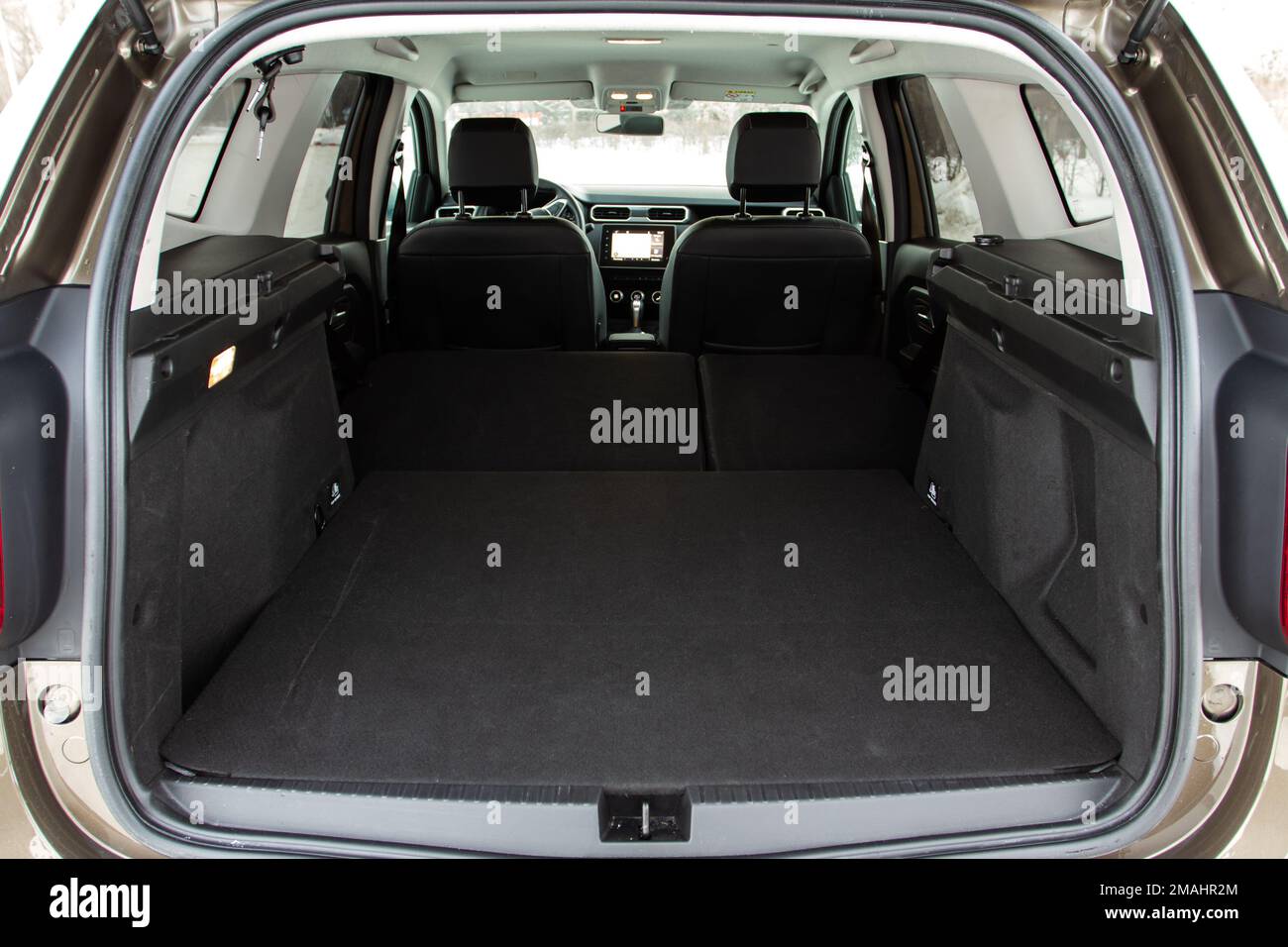 Huge, clean and empty car trunk in interior of compact suv. Rear view ...