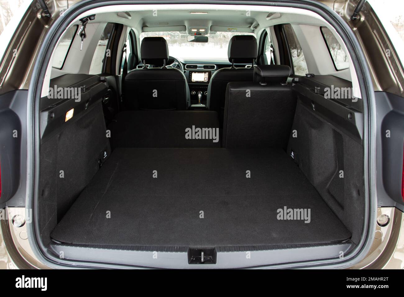 Huge, clean and empty car trunk in interior of compact suv. Rear view ...
