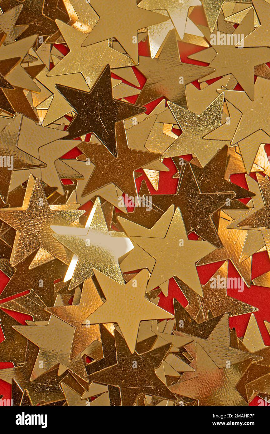 Large pile of gold texture shiny stars pattern background Stock Photo ...