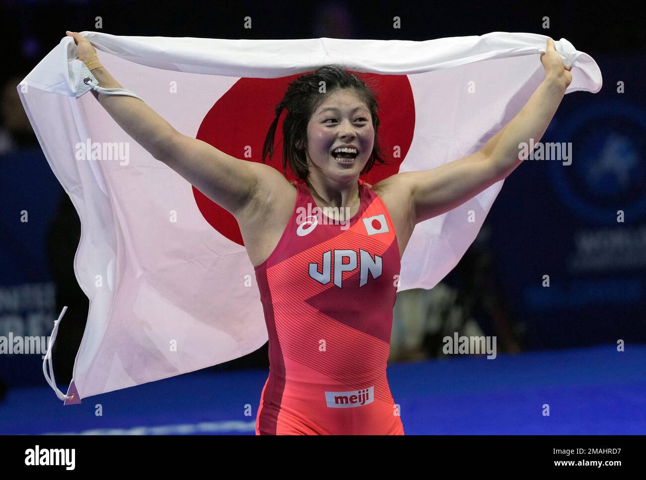 Japan's Miwa Morikawa celebrates after her women's freestyle 65 kg ...
