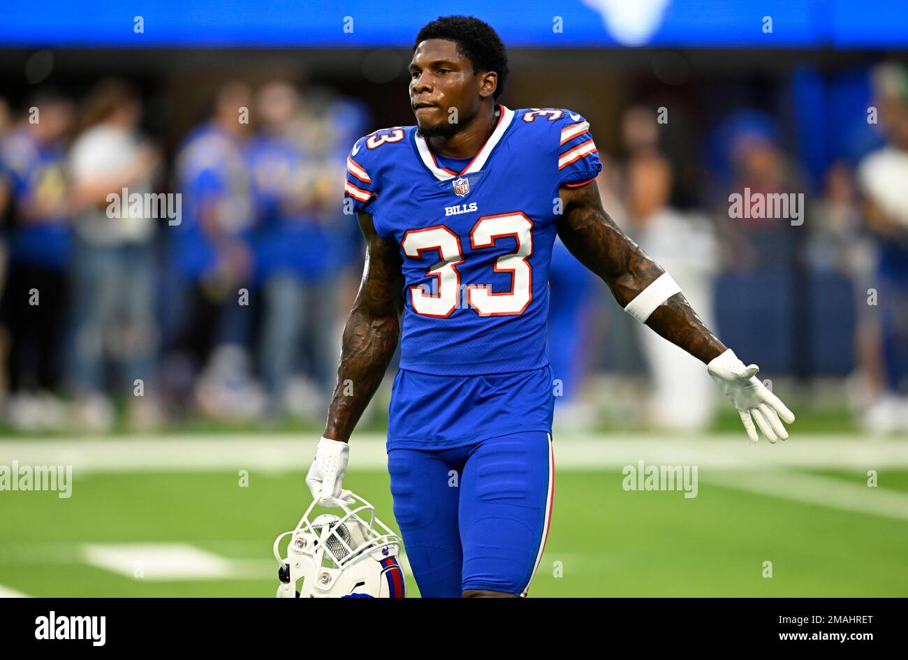 Buffalo Bills cornerback Siran Neal (33) with his helmet off while ...