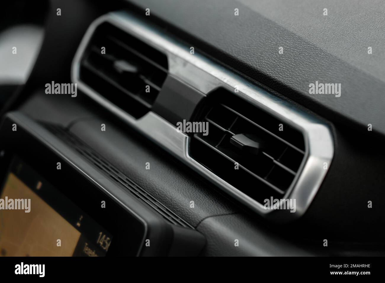 Car air conditioning close up view. The air conditioner flow inside the ...