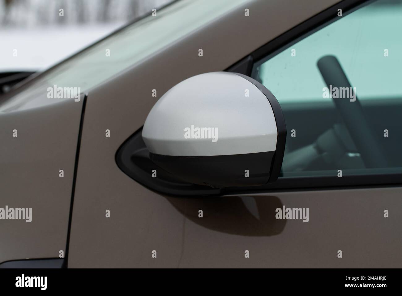 Side rear-view mirror on a modern car. Closeup photo of a car mirror ...