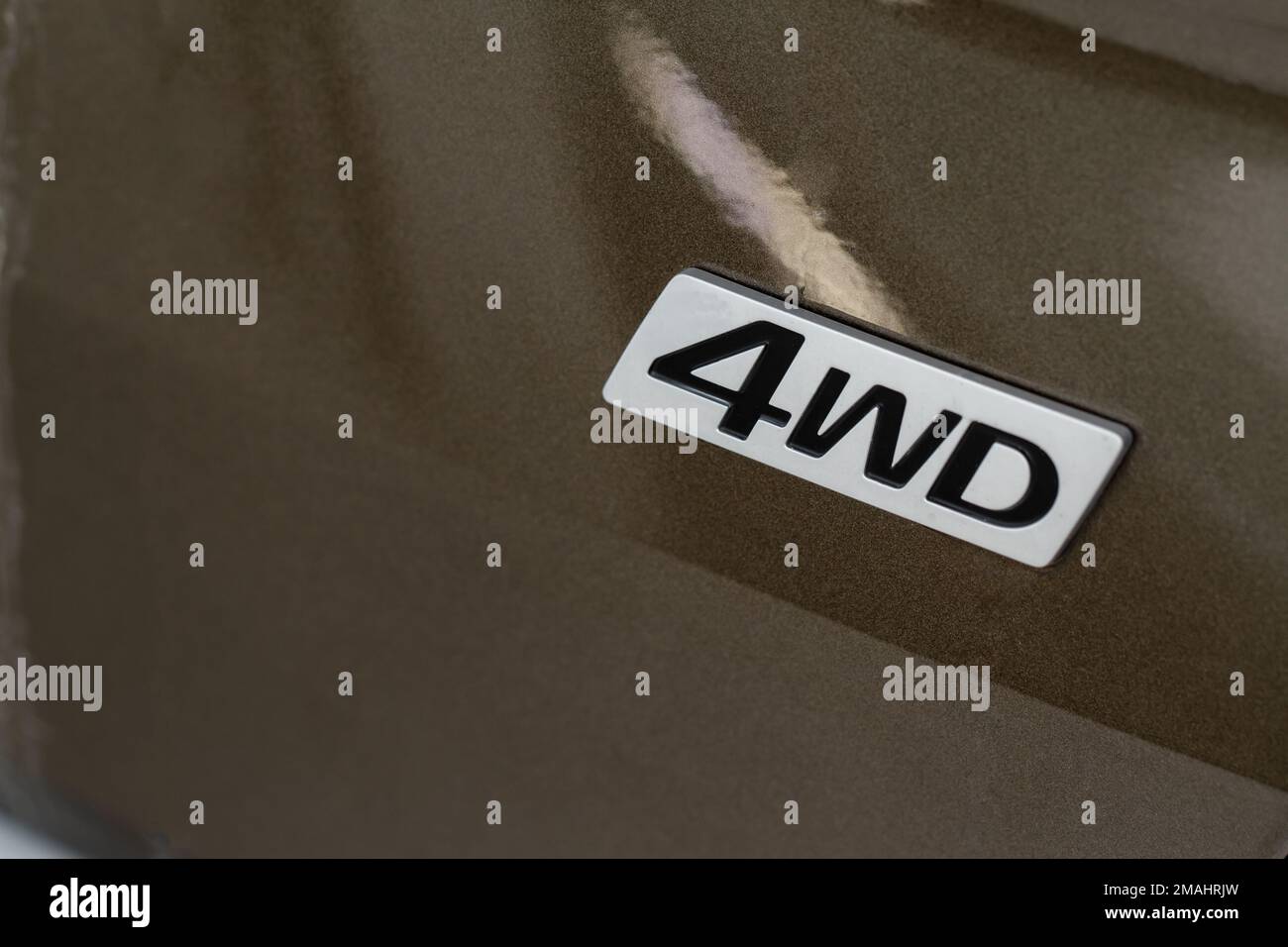 4WD emblem on modern SUV car detail close up view. Four Wheel Drive ...