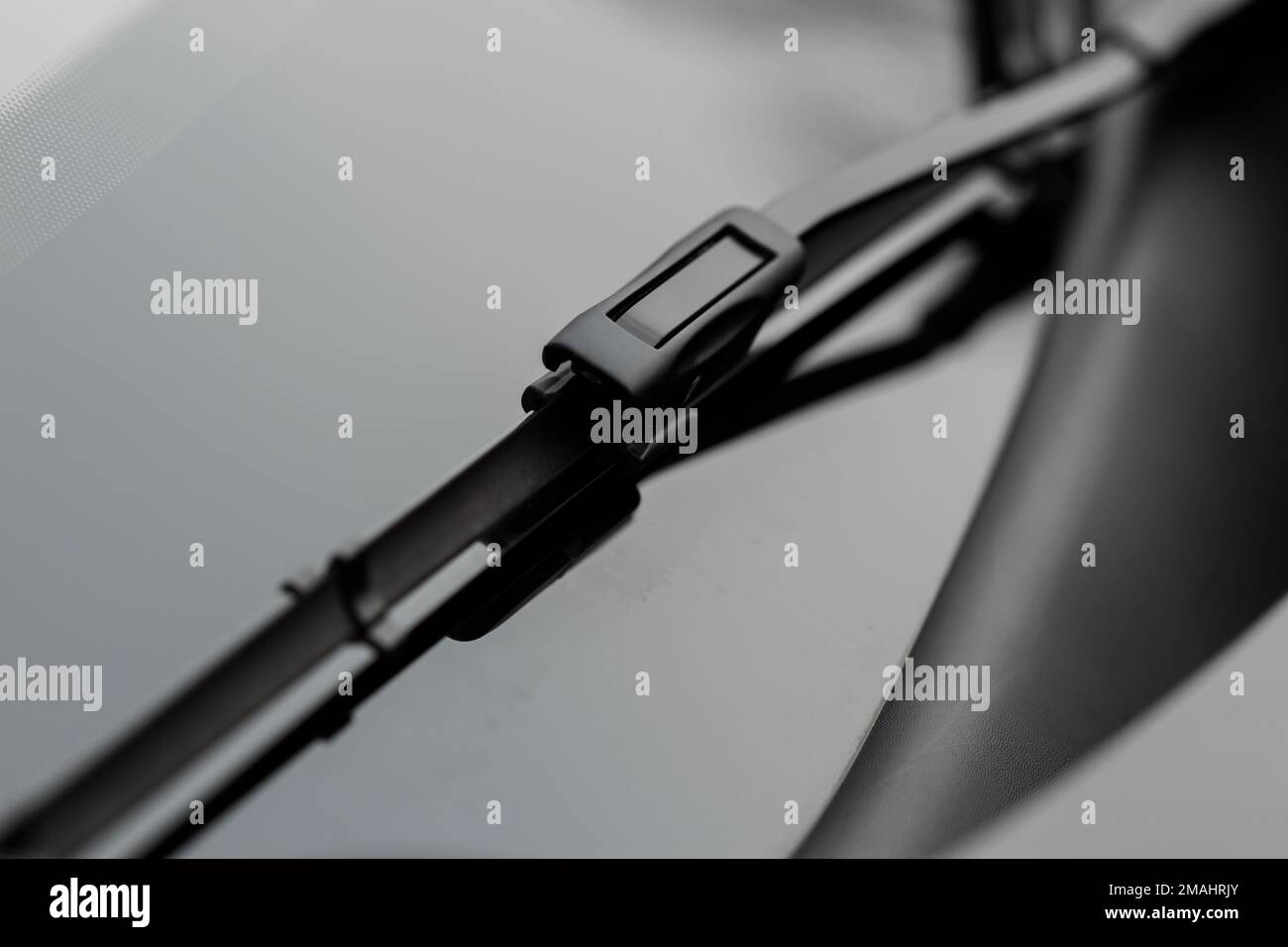 Modern car windscreen wiper. Windshield wiper. Closeup of car ...