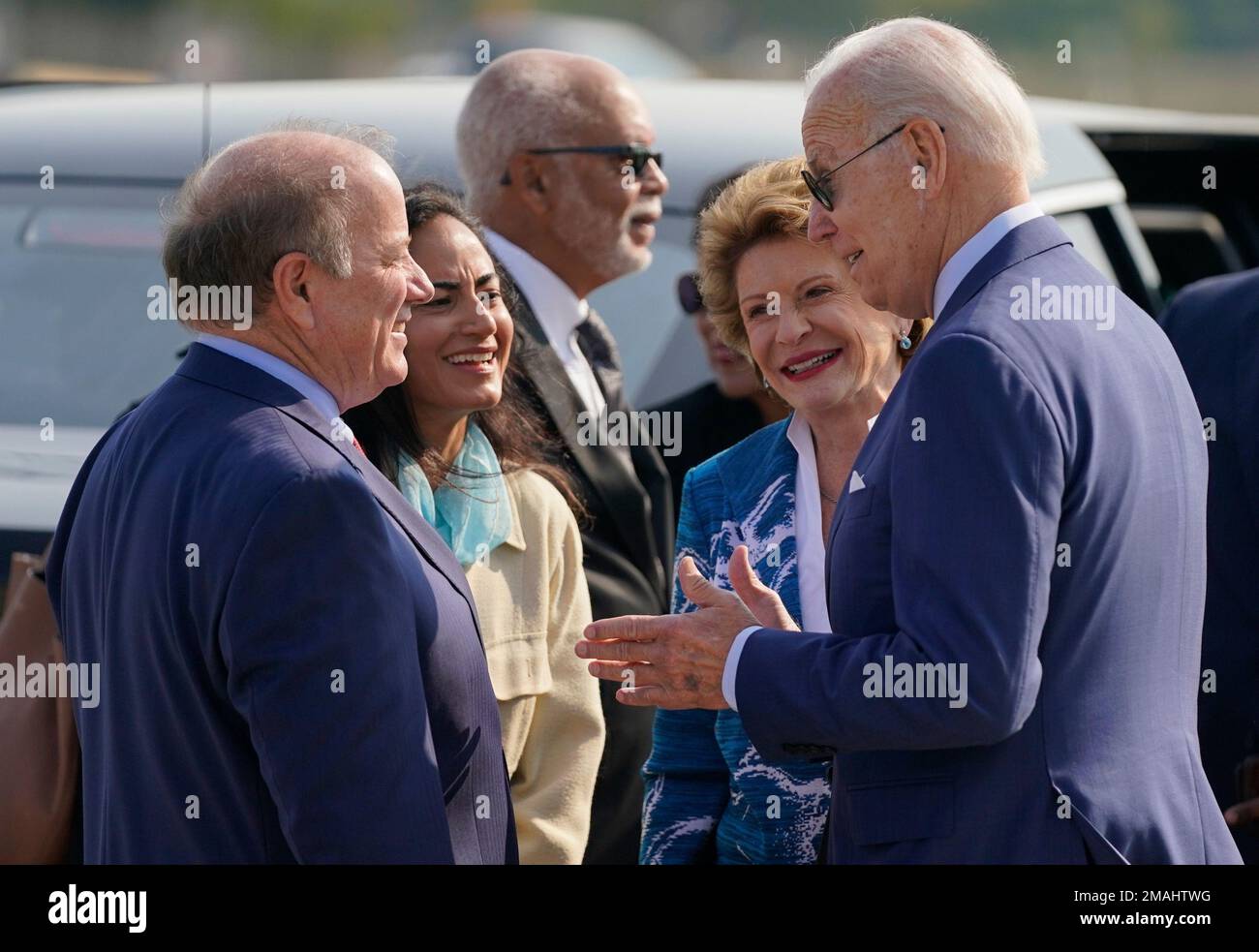 President Joe Biden speaks with Sen. Debbie Stabenow, D-Mich., second ...