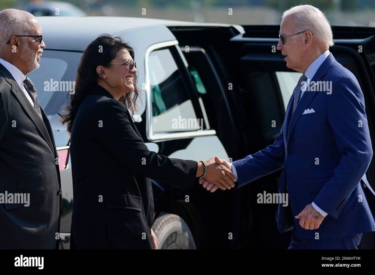 President Joe Biden shakes hands with Rep. Rashida Tlaib, D-Mich., as ...