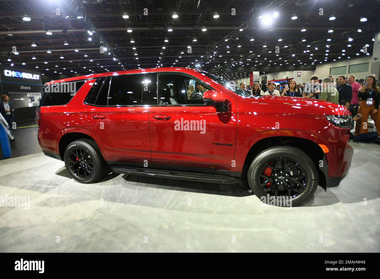 Guests and media members look over the 2023 Tahoe RST Performance ...