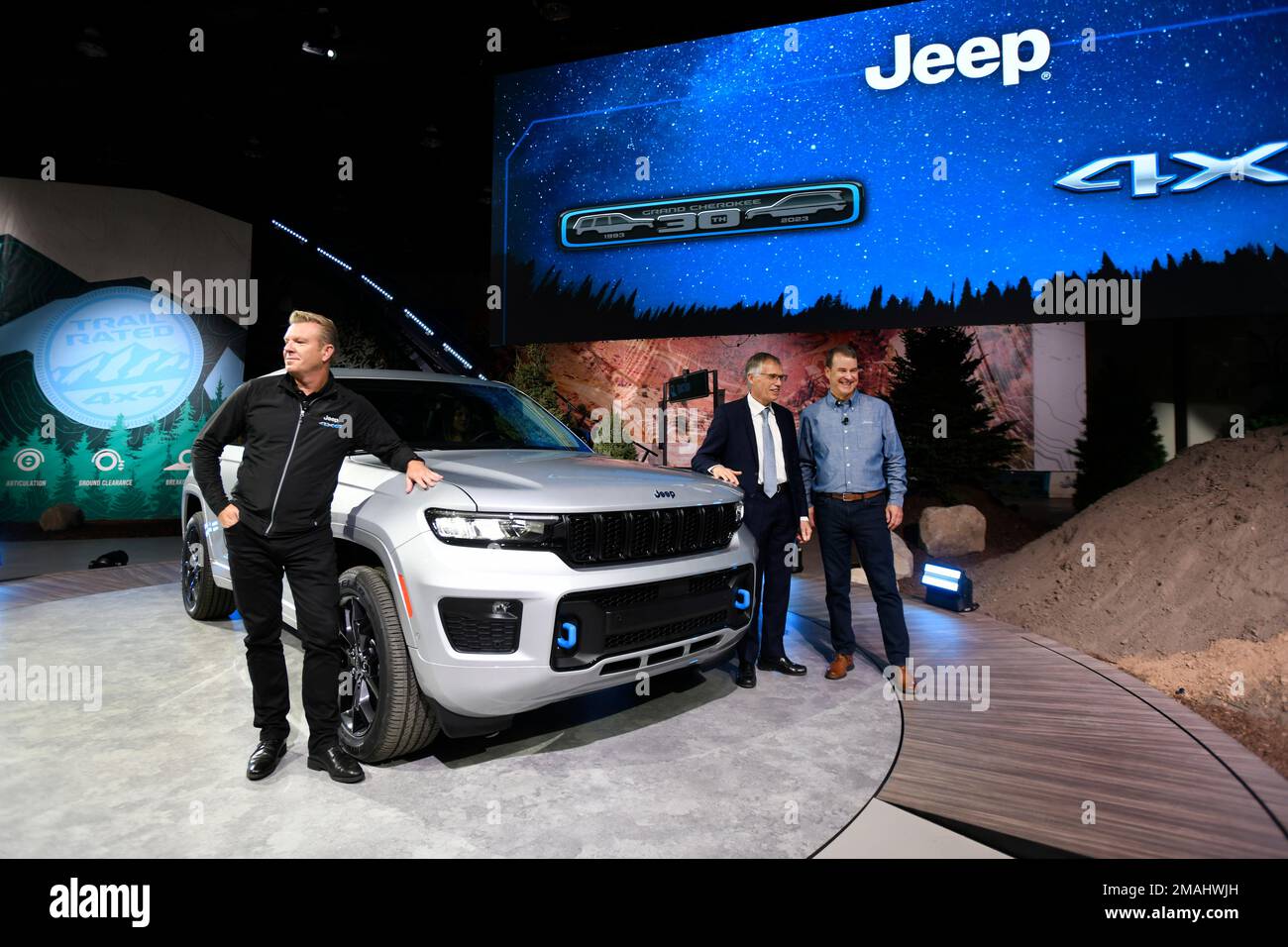 From left, Christian Meunier, Jeep Brand CEO, Carlos Tavares ...