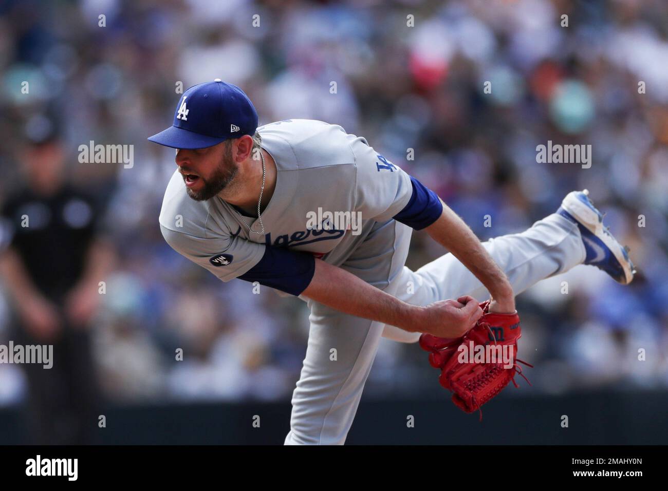 Los Angeles Dodgers' Chris Martin follows through on a pitch against ...