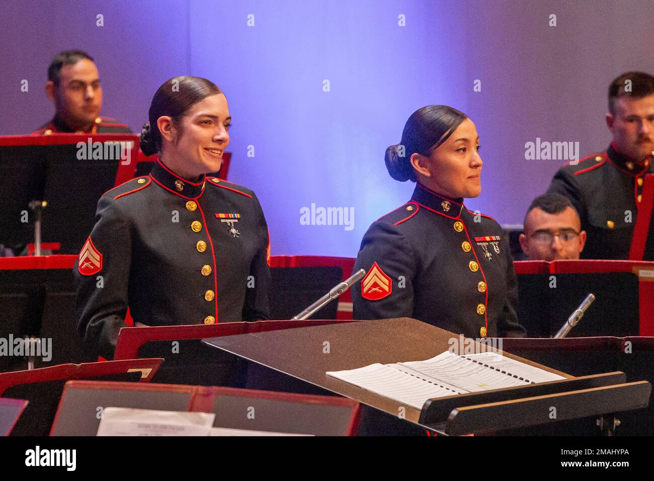 U.S. Marine Corps Cpl. Claire Molohan, left, a piccolo instrumentalist ...