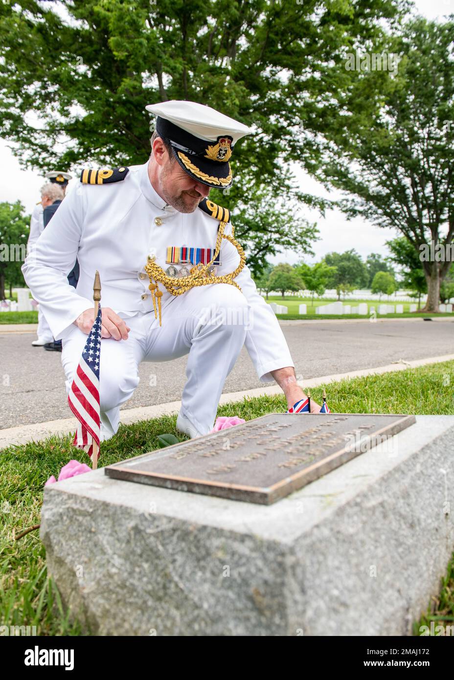 British Royal Navy Cmdr. Derek Powles, the assistant naval attaché at ...