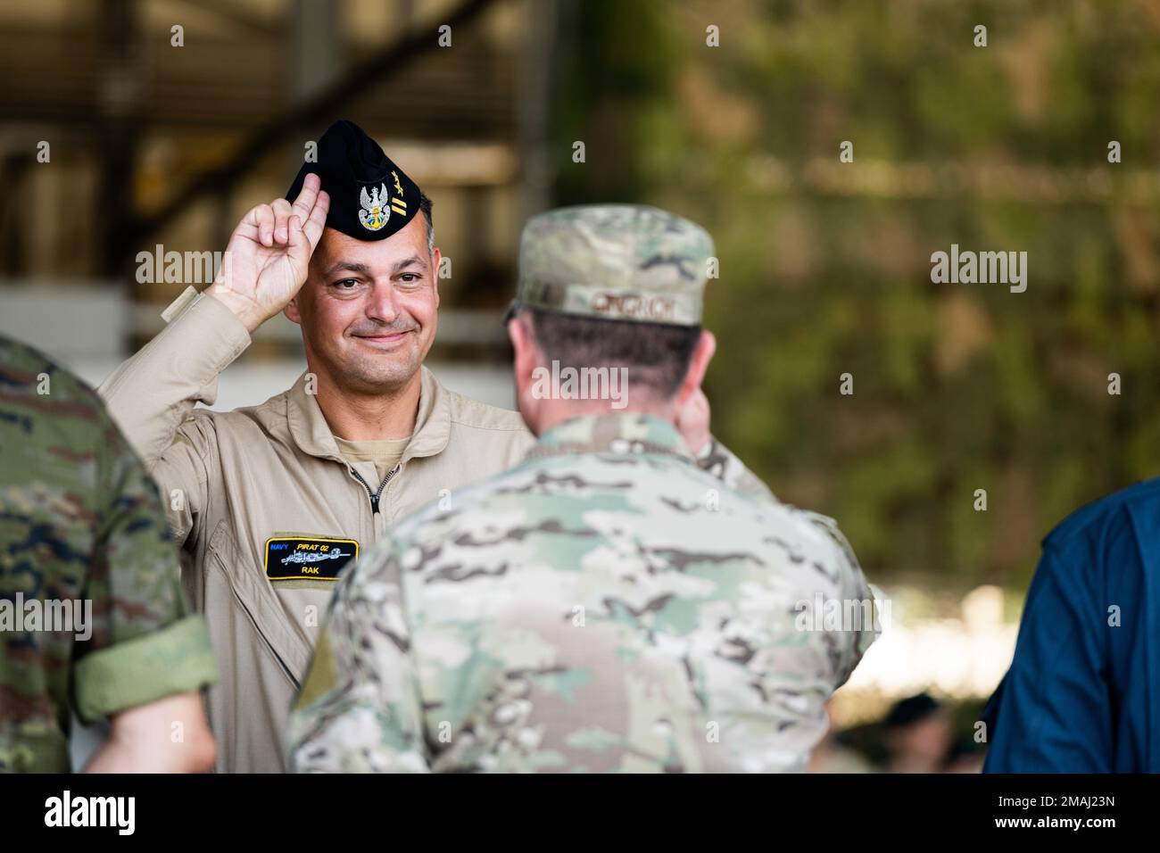Polish Navy Cmdr. Sebastian Rak, outgoing commander of the Polish ...