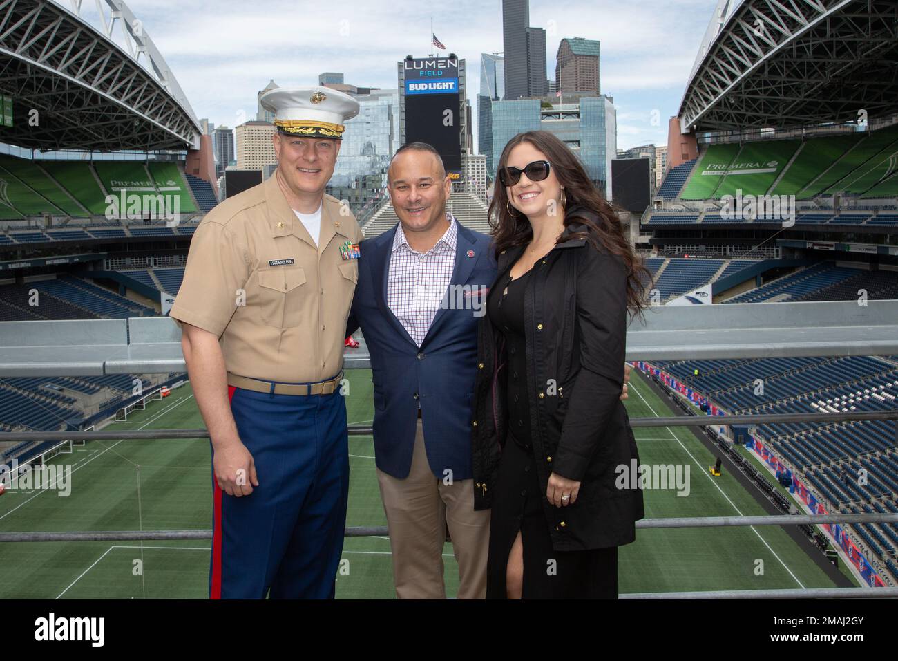 U.S. Marine Corps Maj. Cody Hardenburgh, left, the former commanding ...