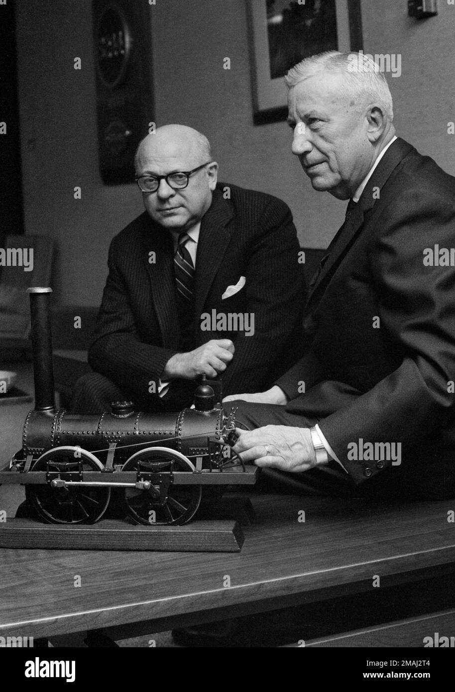 S.T. Saunders, left, new chief executive of the Pennsylvania Railroad ...